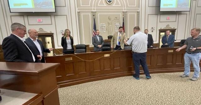 Connecting the cord: inverse ribbon-cutting celebrates rural broadband ...