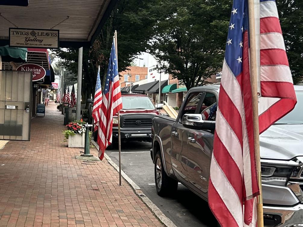 Downtown flags fly proudly on patriotic holidays, but how do they get ...