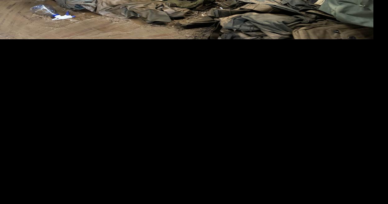 Old Grouch's military surplus store hanging on despite storm damage ...