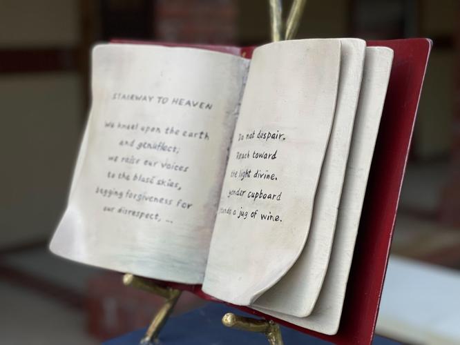 Library sculpture honors famous Canton poet: Artist captures joy of ...