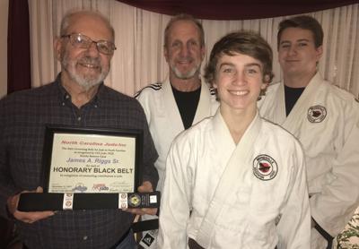 Honorary black belt certificate presented to father and grandfather ...