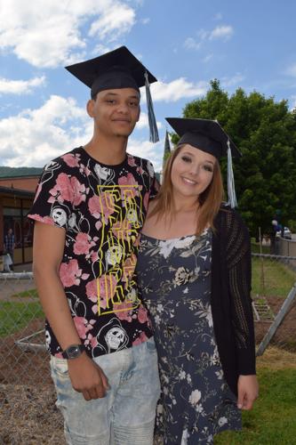 Diploma dreams come true during drive-thru graduation ...