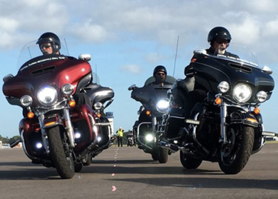 Precision riding on display by motorcycle drill team | Arts ...