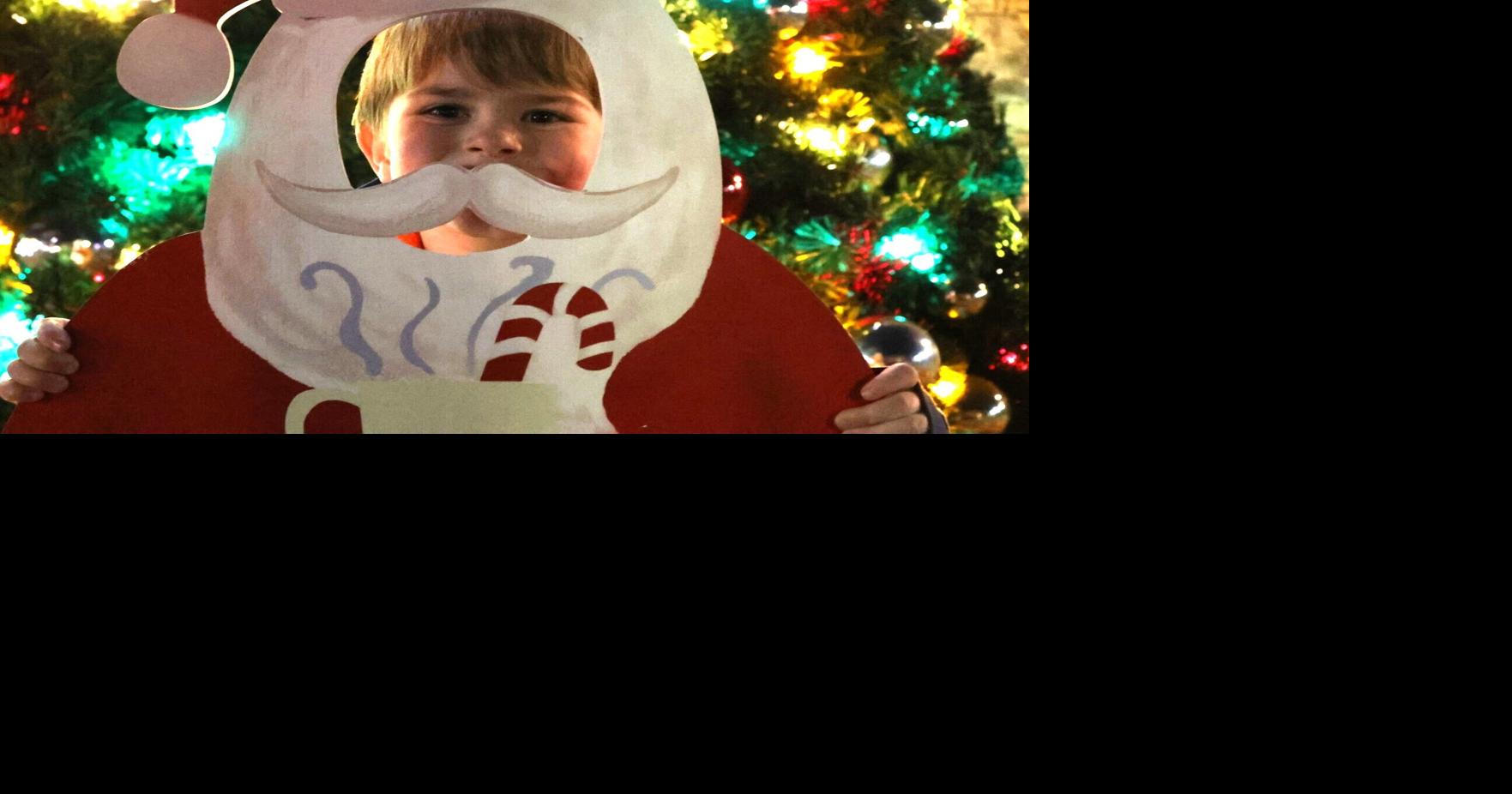kid with santa face | | themountaineer.com