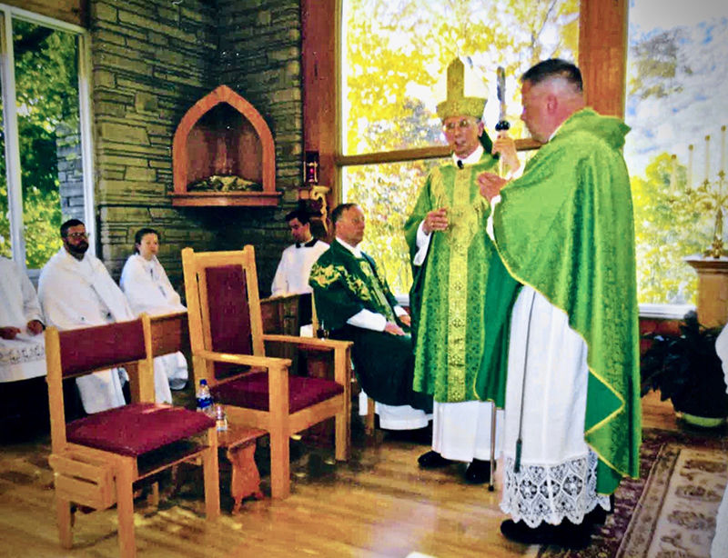 Two area priests installed as pastors | Religion | themountaineer.com