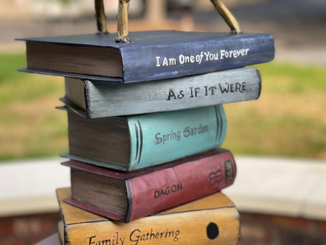 Library sculpture honors famous Canton poet: Artist captures joy of ...
