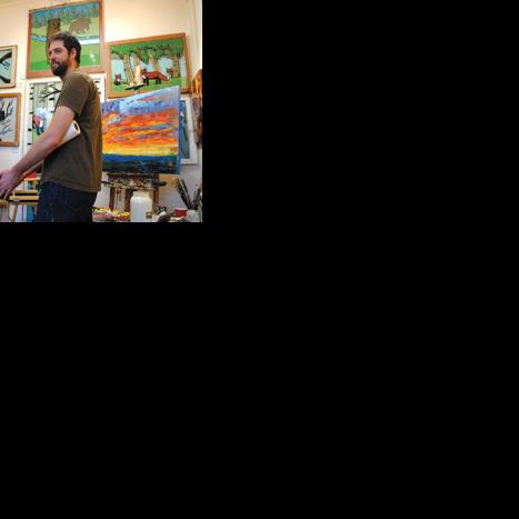 Artist Carl Bork works on his abstract landscape painting | Free ...