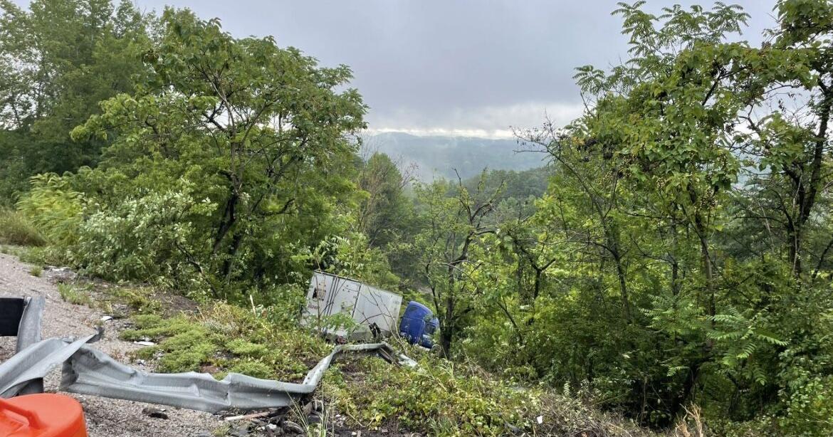 Driver survives after rig crashes through guardrail | News ...