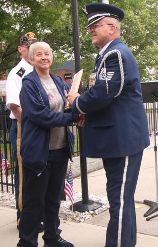 REMEMBERING THEIR SERVICE: Veteran presents U.S. flag to mom to ...