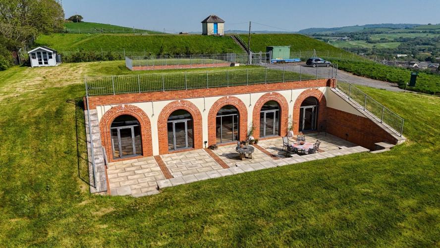 Water reservoir converted into four-bedroom home for sale | National ...