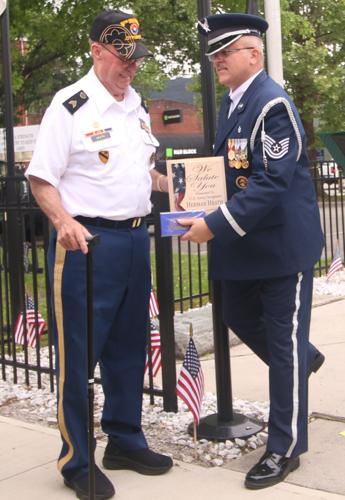 REMEMBERING THEIR SERVICE: Veteran presents U.S. flag to mom to ...