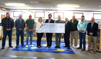 Hargett presents $200k check to Kodak library | News | themountainpress.com