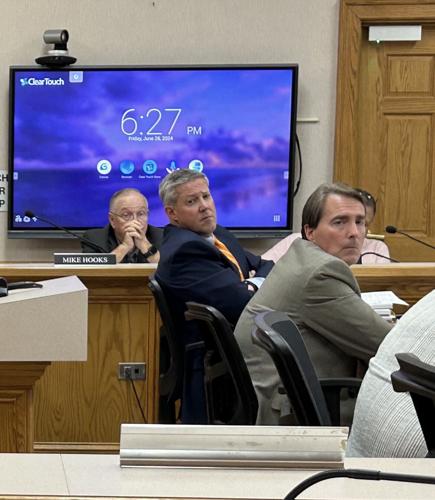 Commission passes budget after register threatens lawsuit | News ...