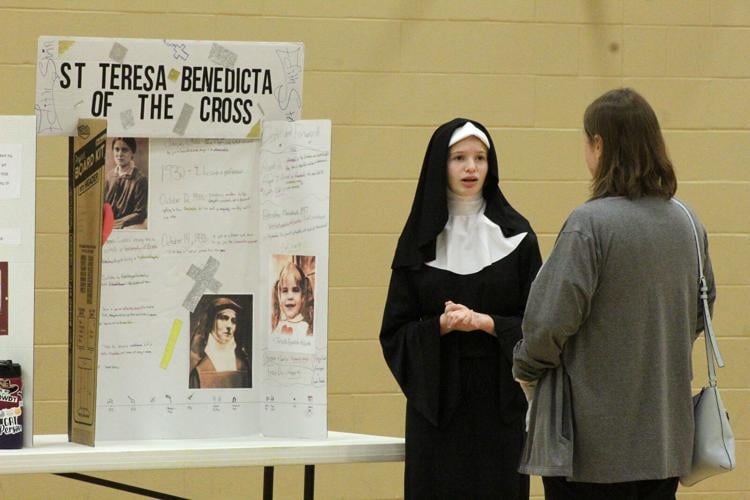 Students bring All Saints Day to life with wax museum | Education ...