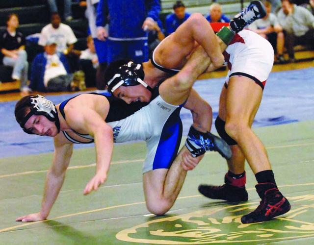 WRESTLING: John Hardin wins second straight region title (02/15 ...