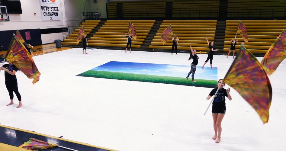 Role reversal: Student turned instructor leads EHS color guard to ...
