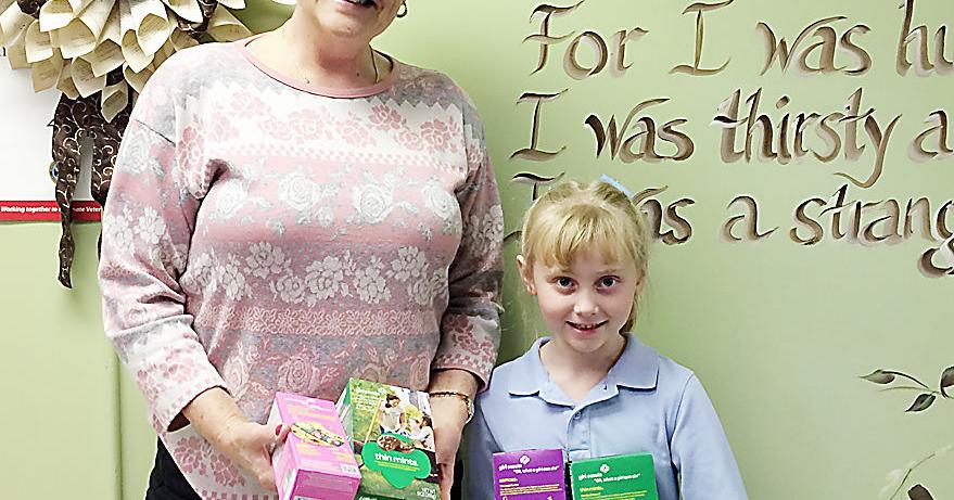 Warm Blessings Receives Donation Of Girl Scout Cookies Neighbors