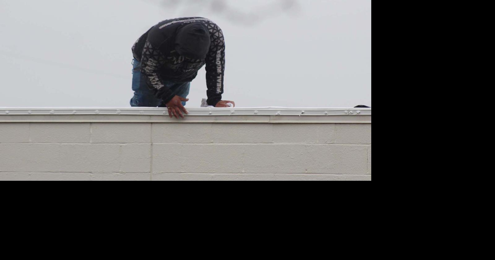 Up on a roof | Local News | thenewsenterprise.com