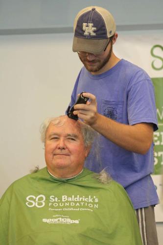 Volunteers shave heads for childhood cancer | Local News ...