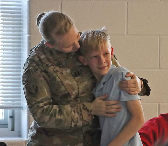 Nelson County soldier surprises children in return from deployment ...