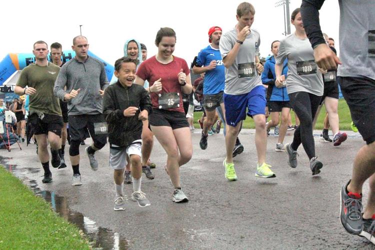 Runners brave elements for annual Trooper Cameron Ponder 5K/10K | Local ...