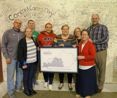 The Cecilian Bank employees volunteer at Feeding America | Neighbors ...
