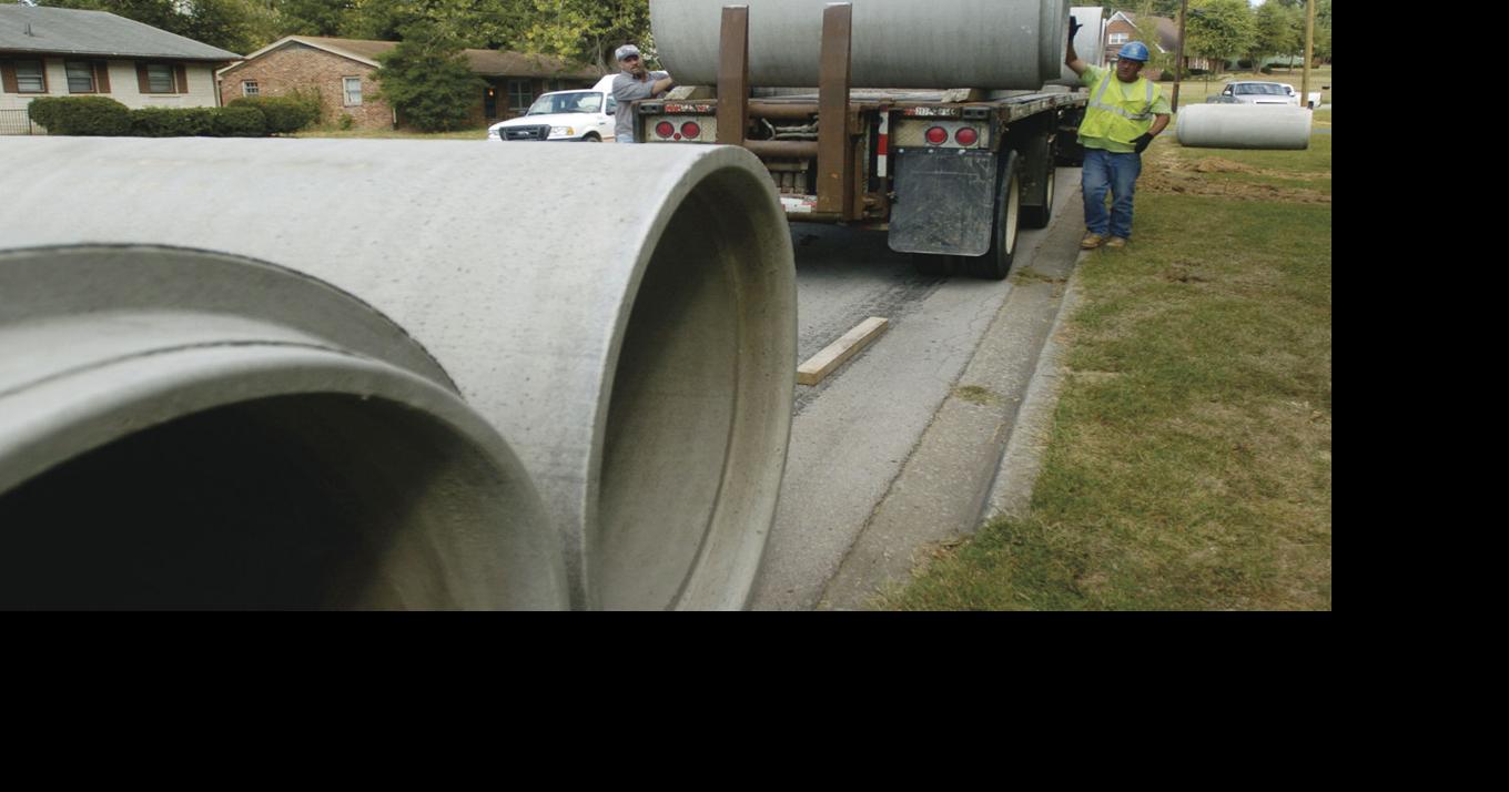 Photos: This job is a drain | News | thenewsenterprise.com