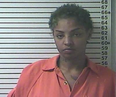 Woman arrested after allegedly spitting on officers, resisting arrest ...