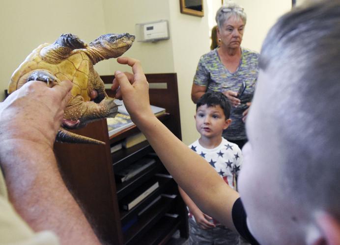 Man shares tales of scales at library | Local News | thenewsenterprise.com