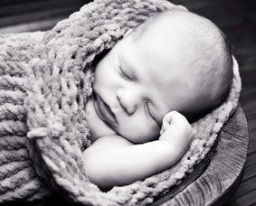 Parents welcome Dominic Travis | Neighbors | thenewsenterprise.com