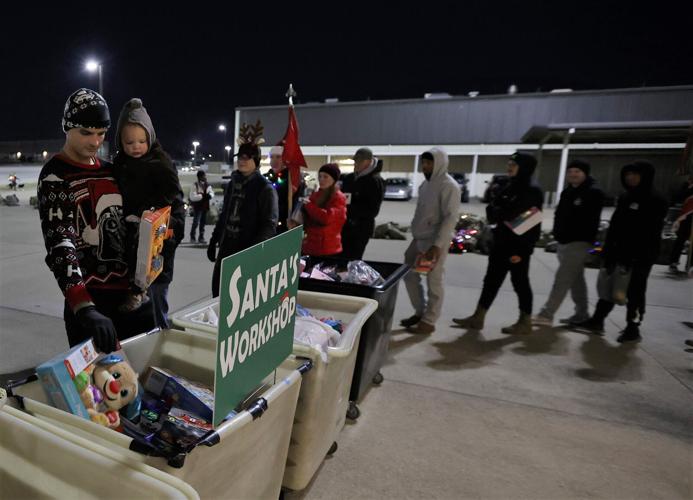 Soldiers deliver toys to Santa’s Workshop in ruck march | Local News ...