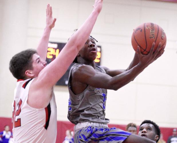 PREP BASKETBALL: John rallies to beat North | Sports ...