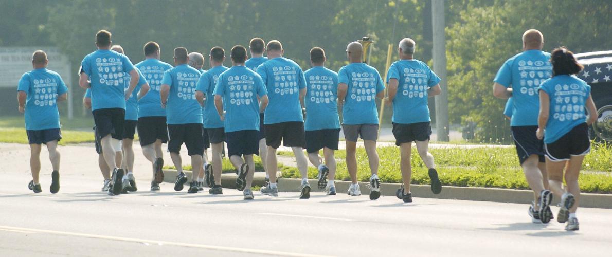 Passing the torch: Area police participate in Special Olympics run ...
