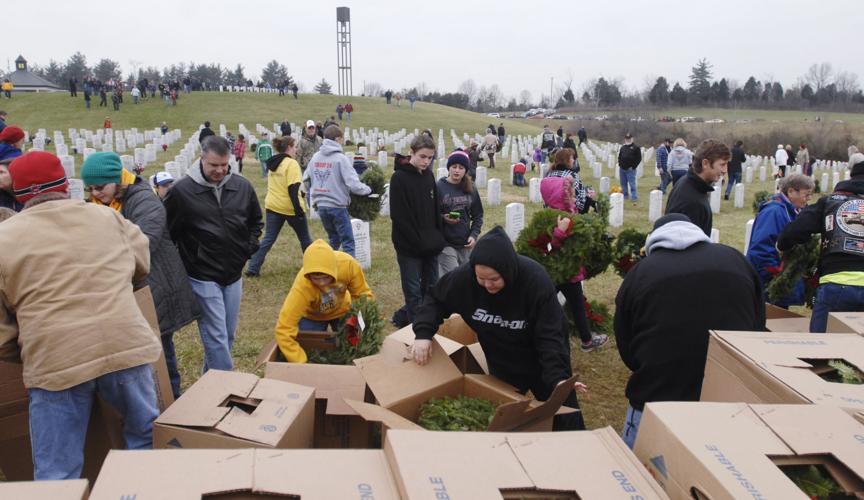 Wreaths of remembrance: Families, volunteers honor veterans at Radcliff ...