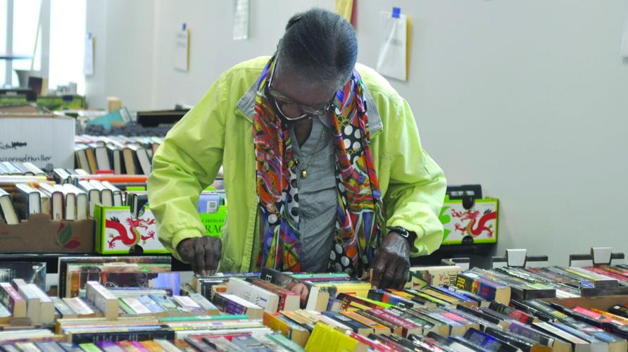 Residents find hidden treasures at spring book sale | Local News ...