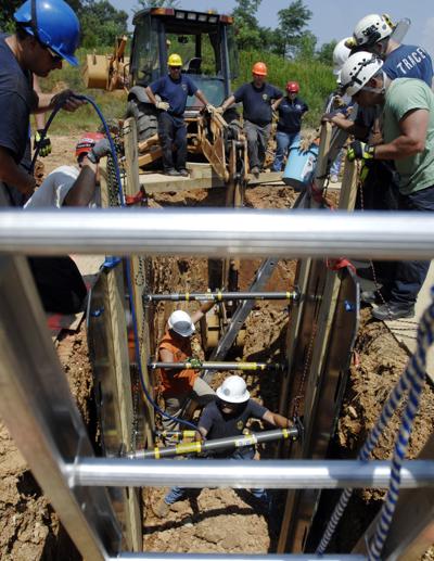 Photo: Down in the trenches | Local News | thenewsenterprise.com