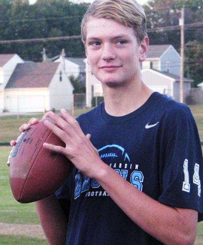 Hobbs runs drills on the football field and the pages of scripture ...