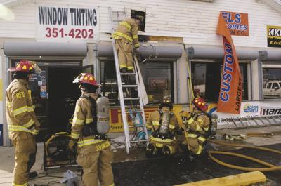 Photo: Fighting a small fire | News | thenewsenterprise.com