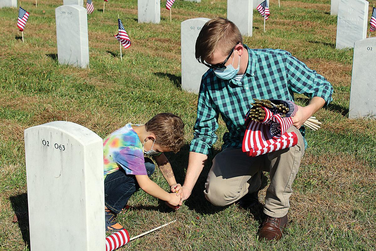 Honoring Heroes: U.S. flags placed on veterans’ graves | Local News ...
