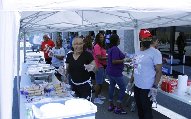 Loving people: Community cookout offers prizes, groceries, Gospel ...