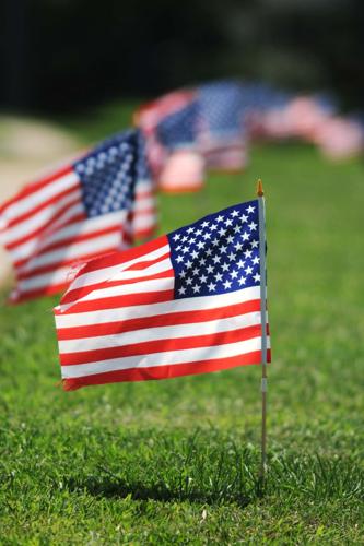 Photo:Furling flags | Local News | thenewsenterprise.com