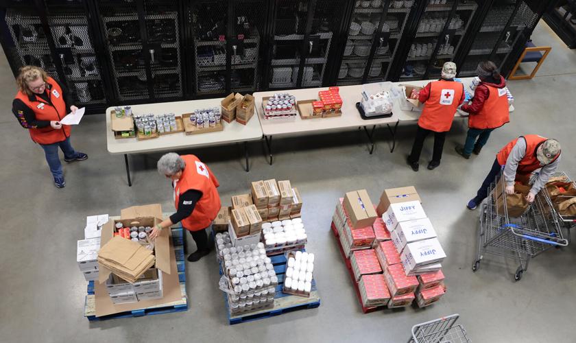 Red Cross packs more than 120 food sacks for soldiers, families for ...