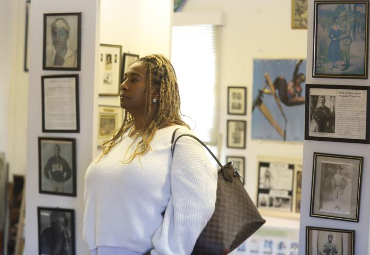 Postal workers join esteemed halls of local Black history gallery ...