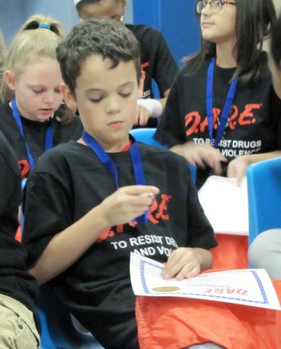 Fifth-graders graduate from D.A.R.E. program | Education ...