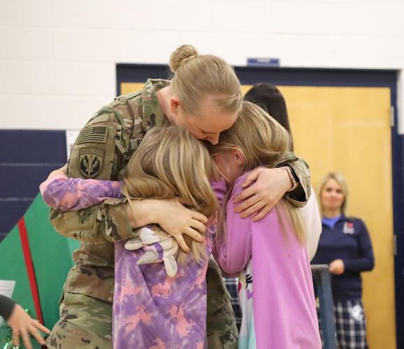 Nelson County soldier surprises children in return from deployment ...