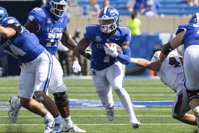 Ray Davis follows in footsteps of powerful UK running backs | College ...