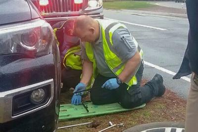 Moore County Paramedics Pitch in on Flat Tire | News | thepilot.com