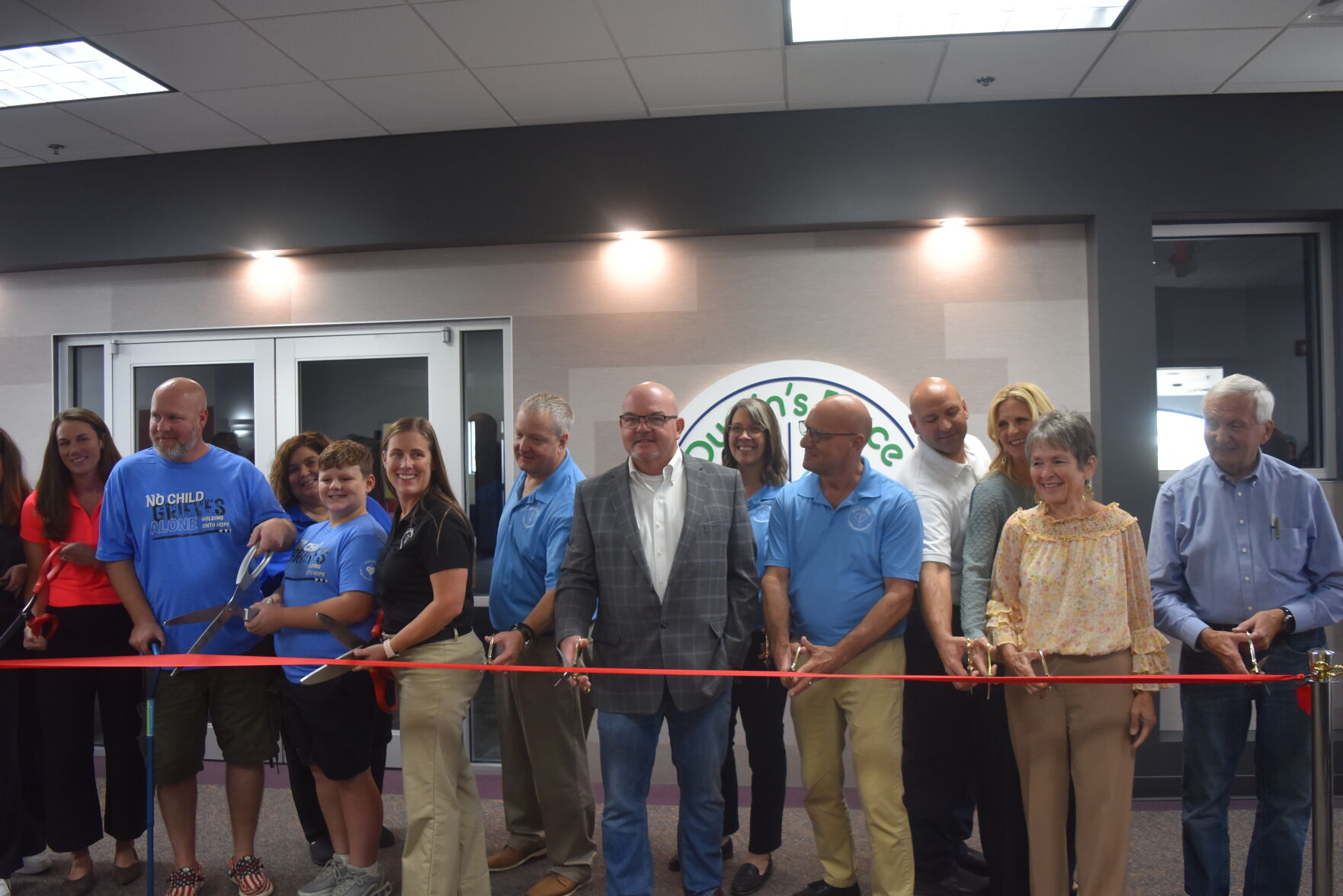Dustin's Place holds ribbon cutting ceremony for new location at ...