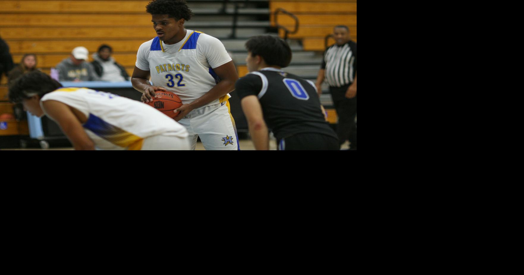 Heritage boys basketball’s Darius Walker and Julian Njelita looking ...