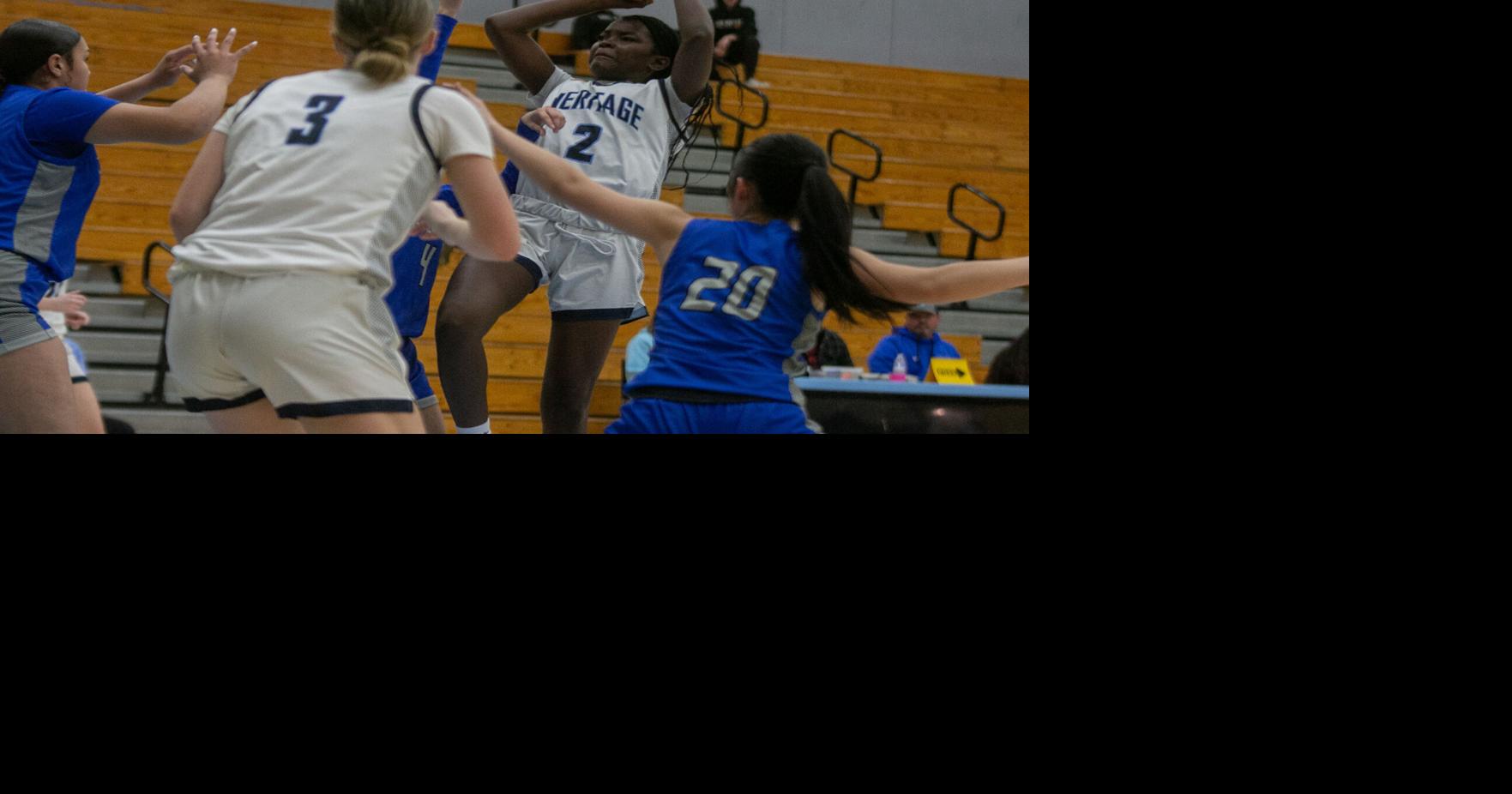 Heritage basketball’s Patterson twins learn key lessons from Caruthers ...